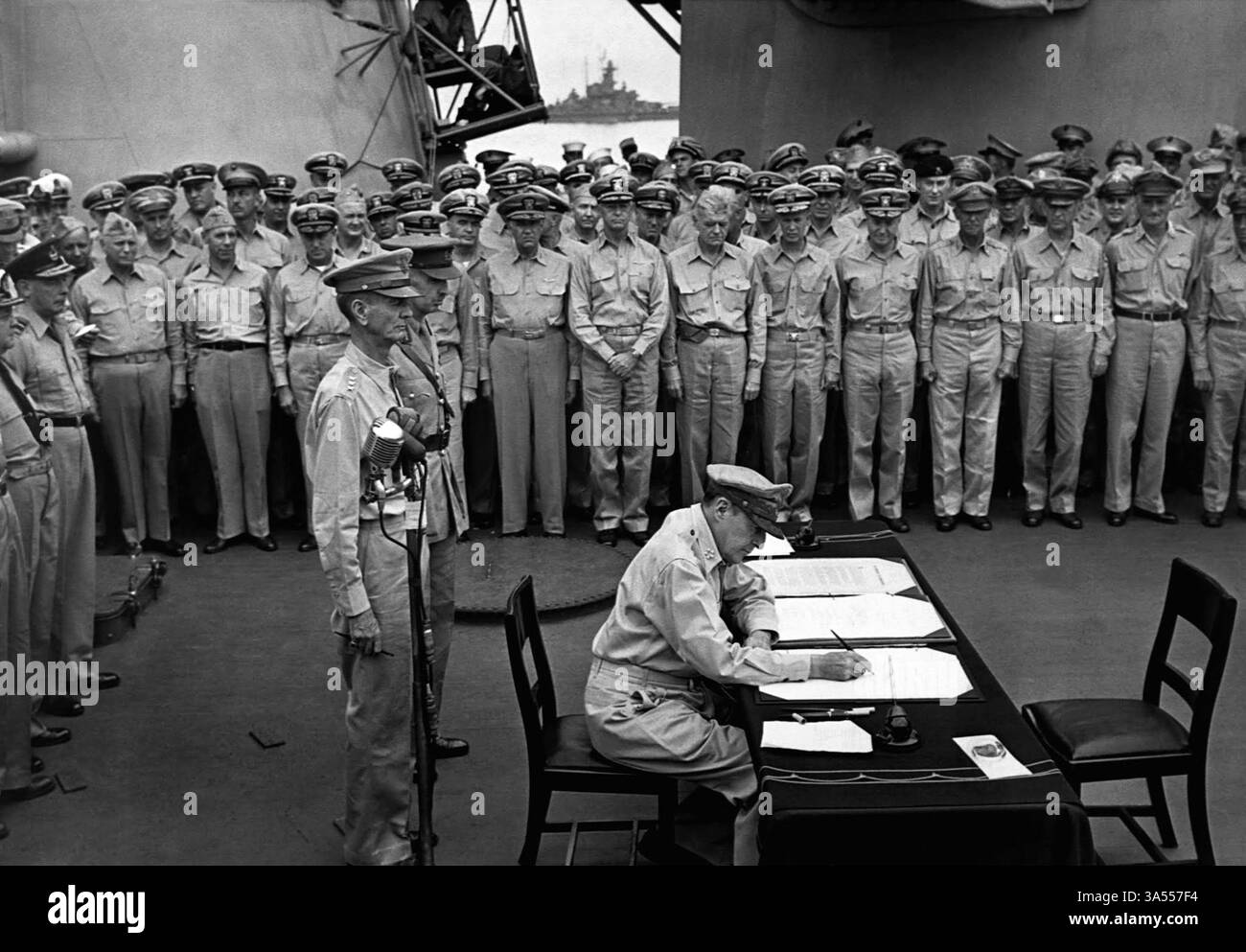 Douglas MacArthur signs the formal Japanese Instrument of Surrender on ...