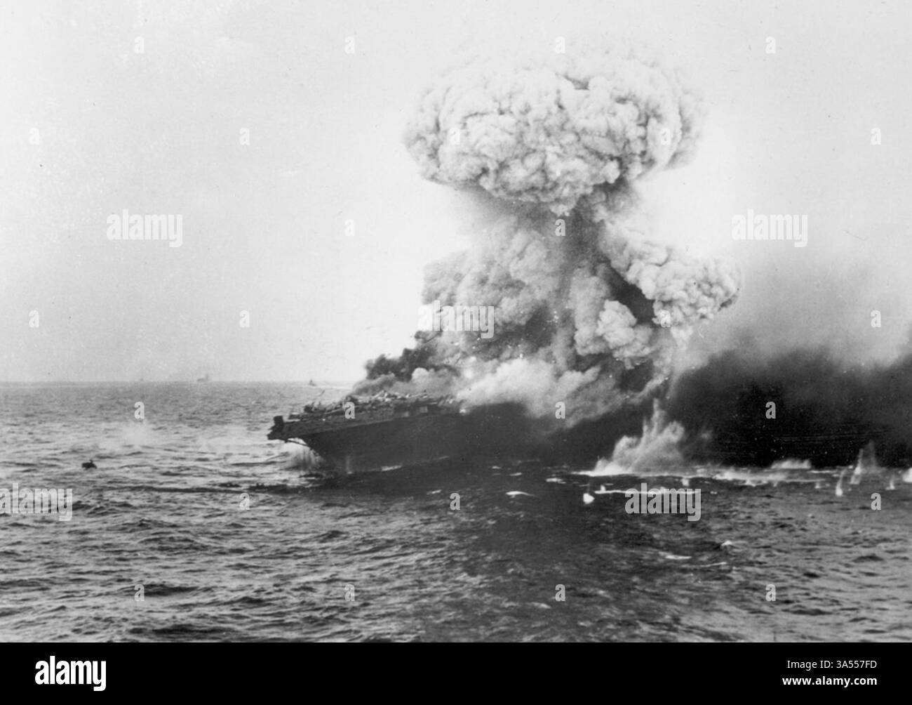The aircraft carrier USS Lexington explodes on 8 May 1942, several ...