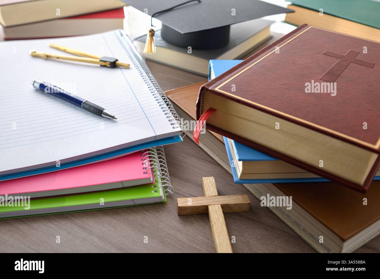 Catholic studies and education with a table full of educational ...