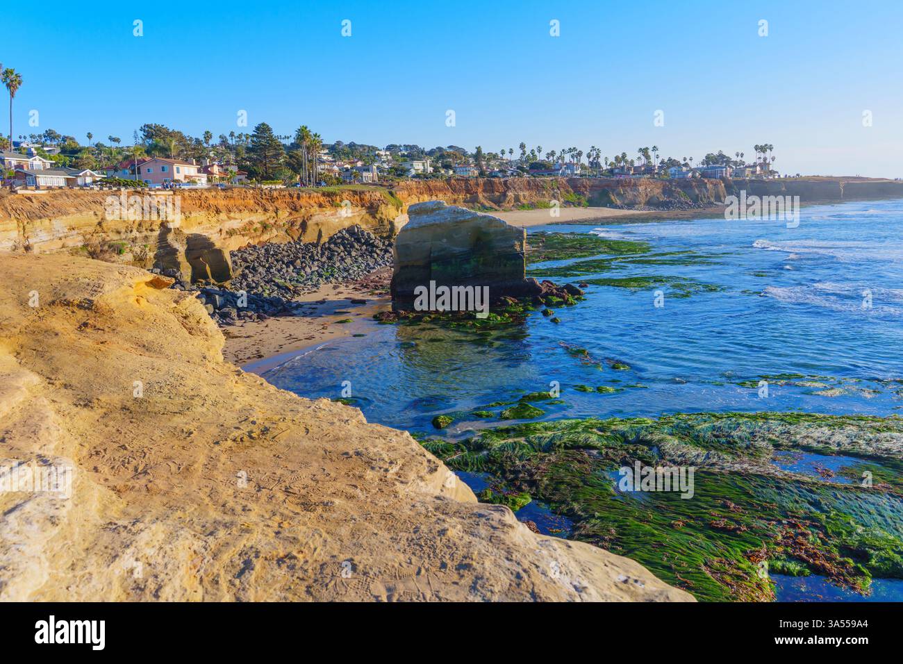 Coastal landscape featuring rocky cliffs, tide pools, and Pacific Ocean ...