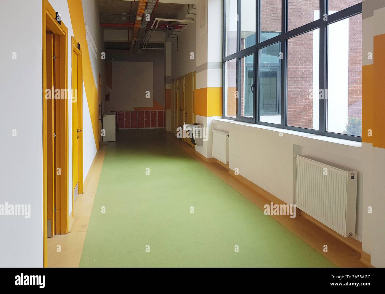 Modern education office with beautiful long corridor. Floor, wall and ...