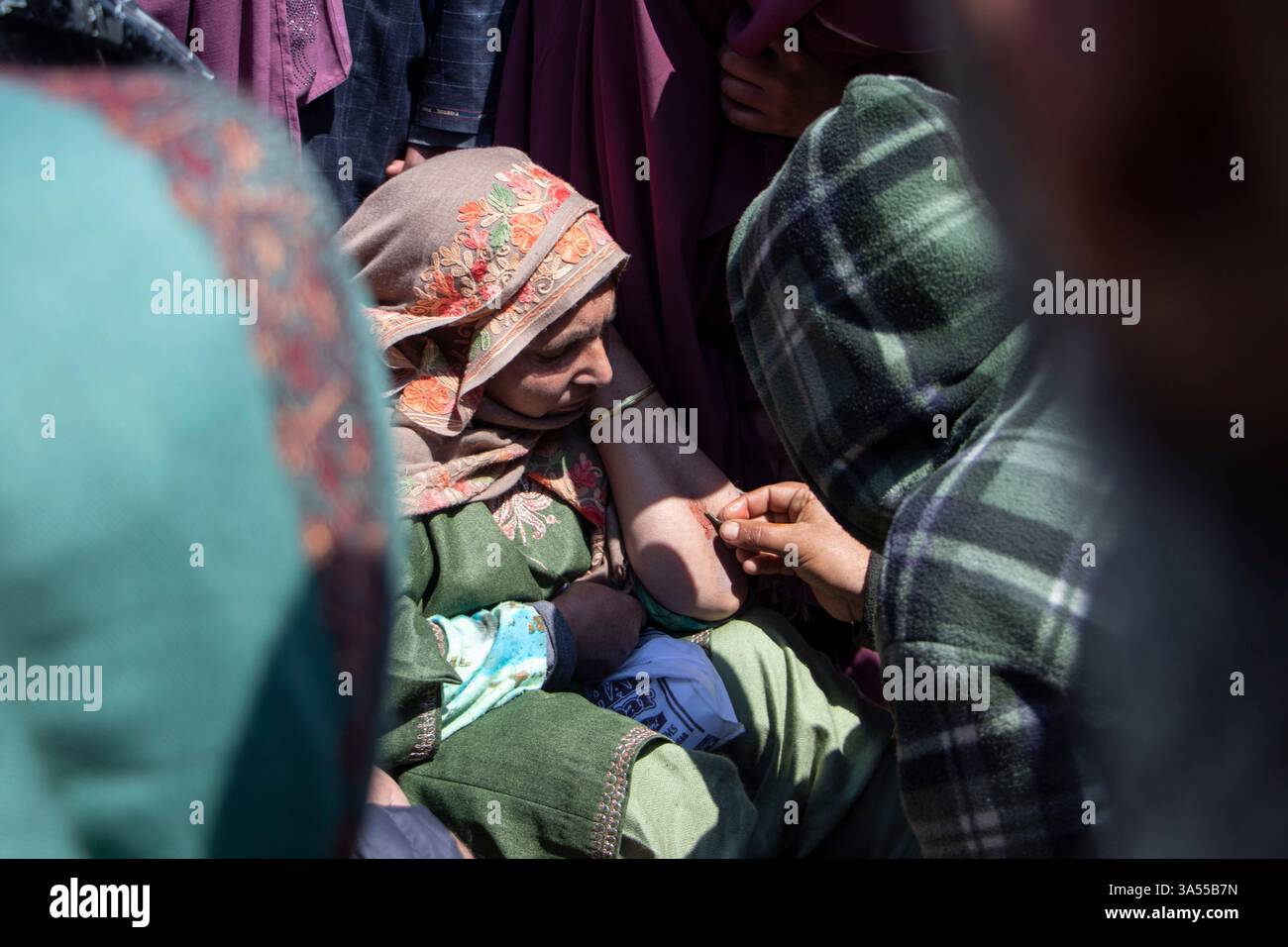 March 21, 2025, Srinagar, Jammu And Kashmir, India: A woman undergoes ...