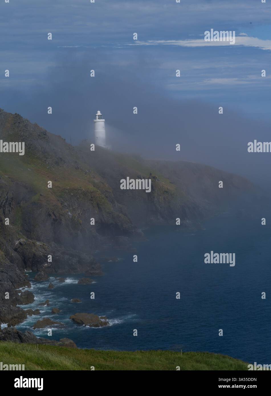 Start Point lighthouse, Devon UK variations of scene in fog Stock Photo ...