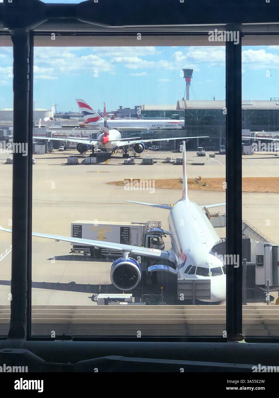 View of airplanes at Heathrow Airport Stock Photo - Alamy