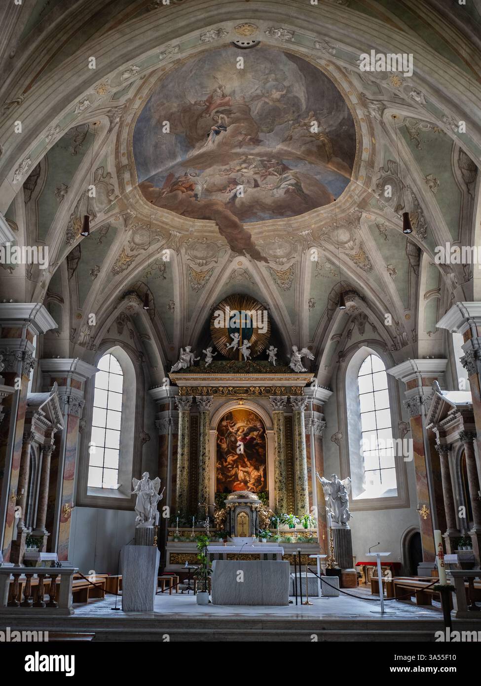 Ornate Altar, Wooden Pews and Detailed Frescoes in Historic Bressanone ...