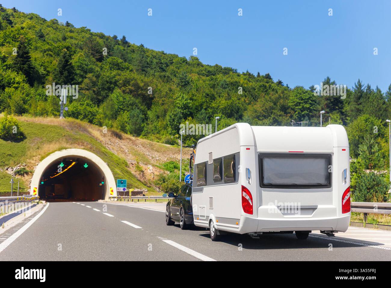 Scenic view big modern white family rv camper van vehicle drive Europe ...