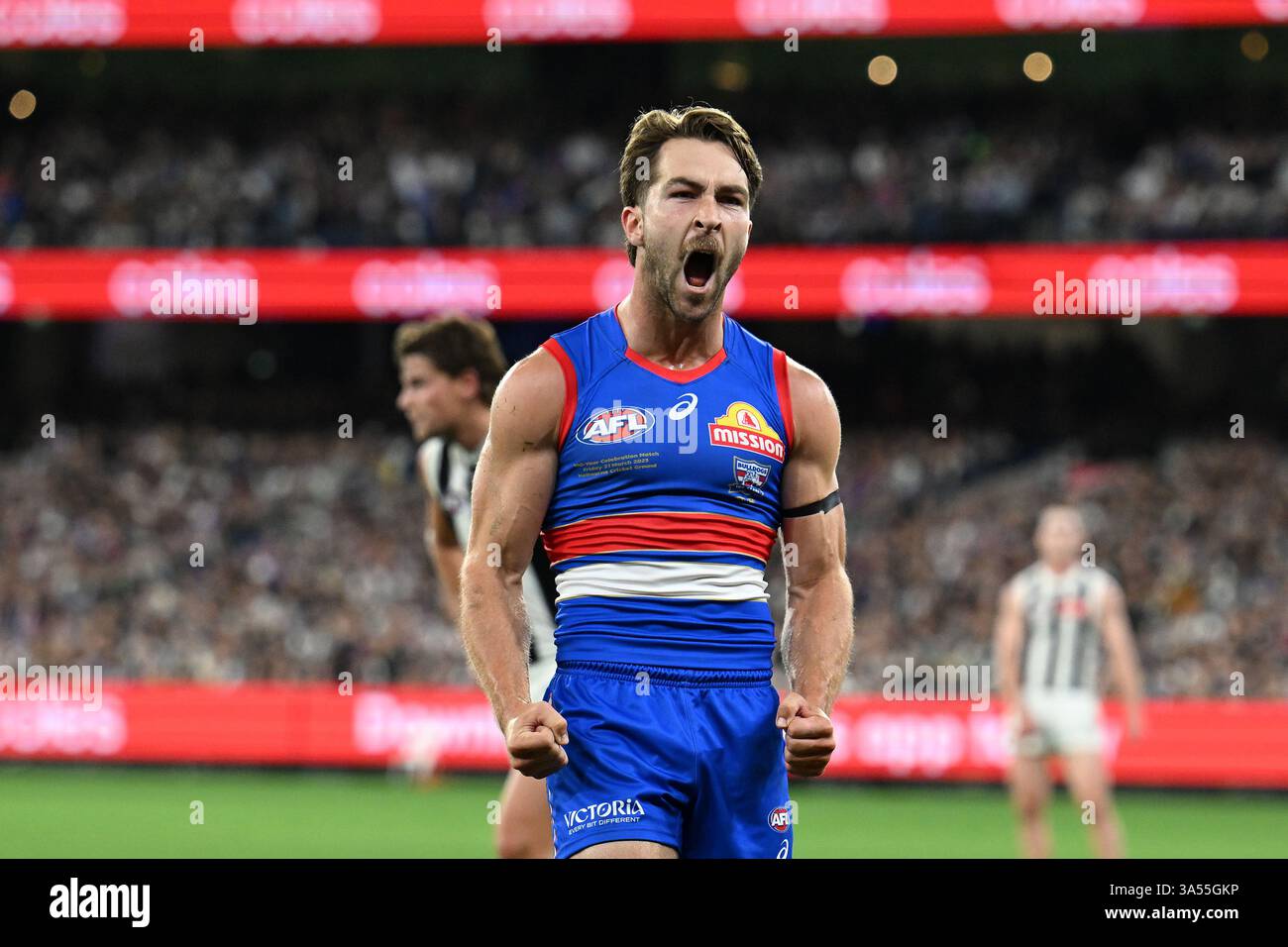 Rhylee West of Western Bulldogs reacts after kicking a goal during the ...
