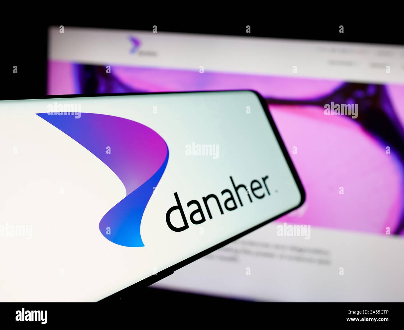 In this photo illustration, a mobile phone with the logo of American life sciences company ...