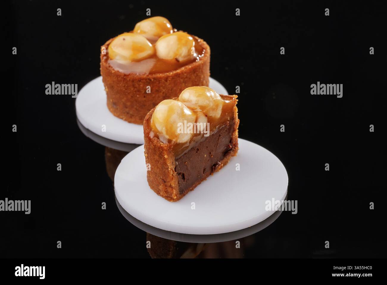 Front view, close up. Delicious cake against black background Stock ...