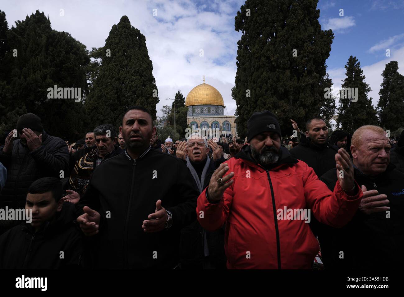 Palestinians perform Friday prayers at the Al-Aqsa Mosque compound in ...
