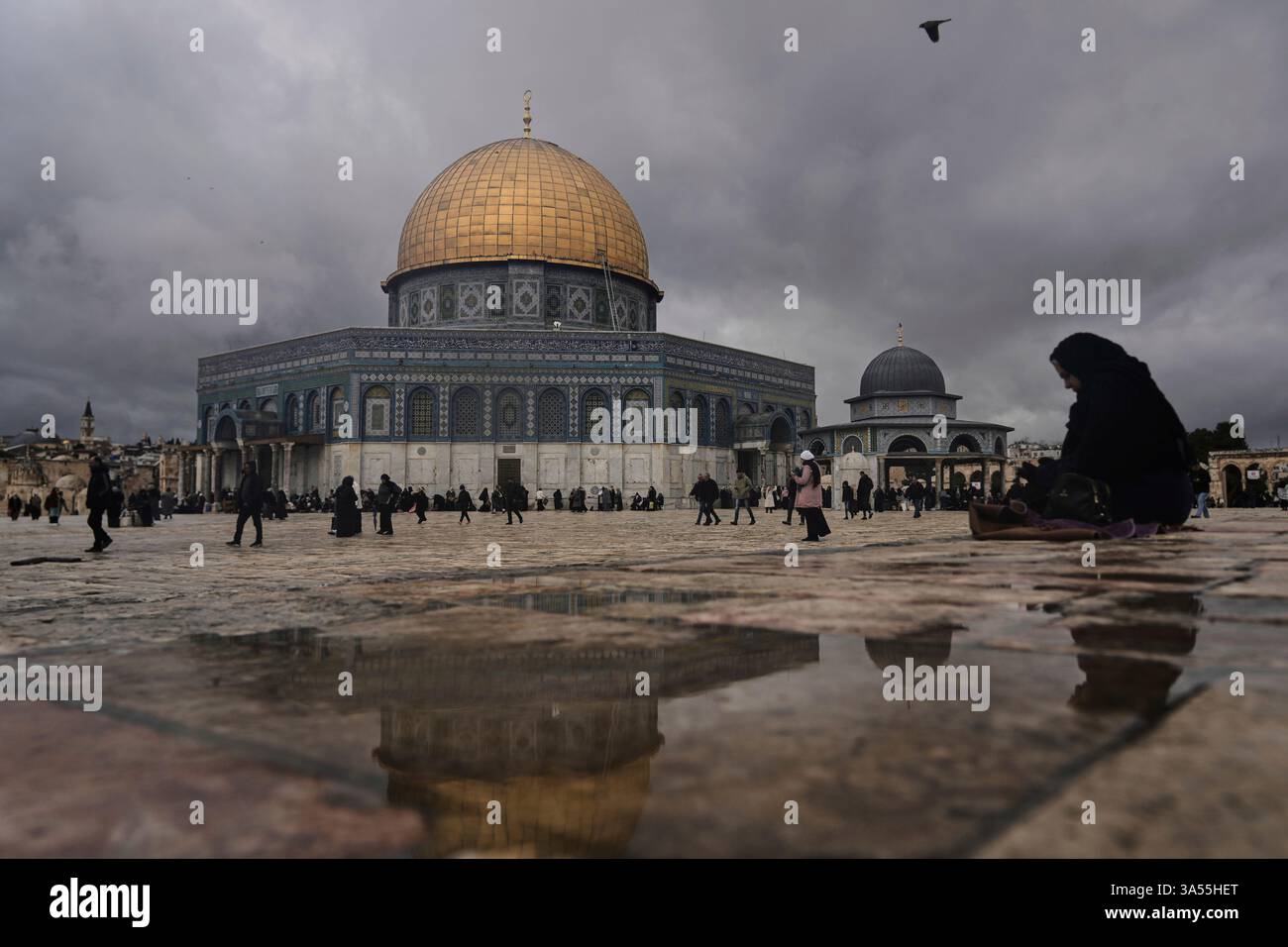 Palestinians gather for Friday prayers at the Al-Aqsa Mosque compound ...