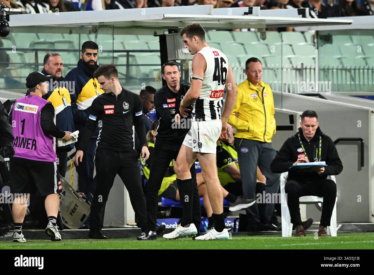 Melbourne, Australia. 21st Mar, 2025. Mason Cox of Collingwood exits ...