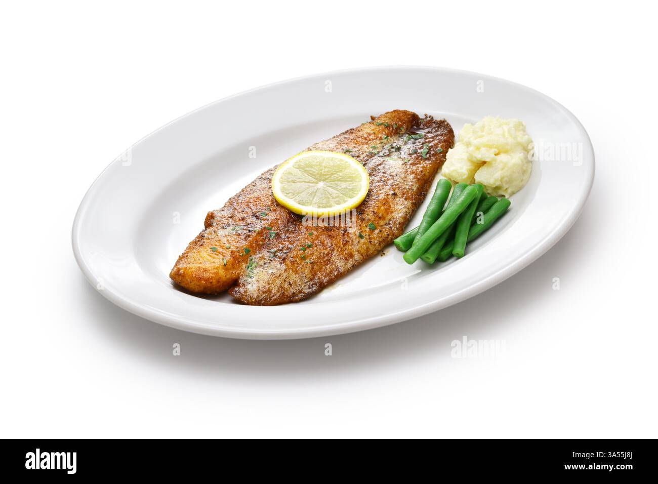 basa fish fillet cajun spiced meuniè Stock Photo - Alamy