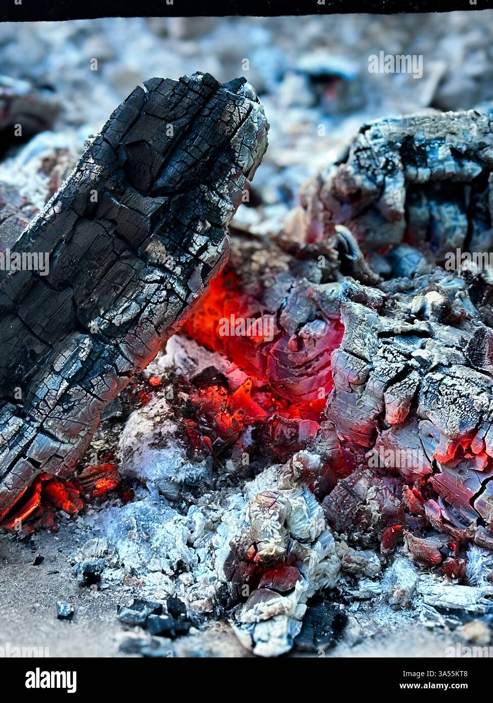 A close up of burning embers and ashes in the fire Stock Photo - Alamy