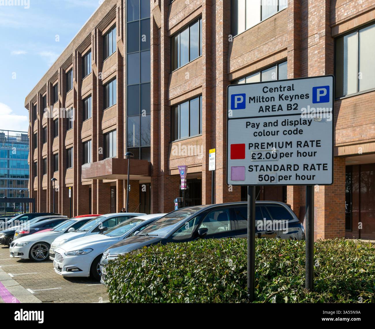 Pay and display parking information sign with prices, Milton Keynes ...
