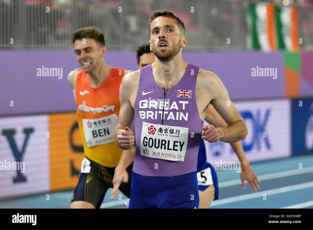 Neil Gourley, of Great Britain, crosses the finish line to win a men's ...