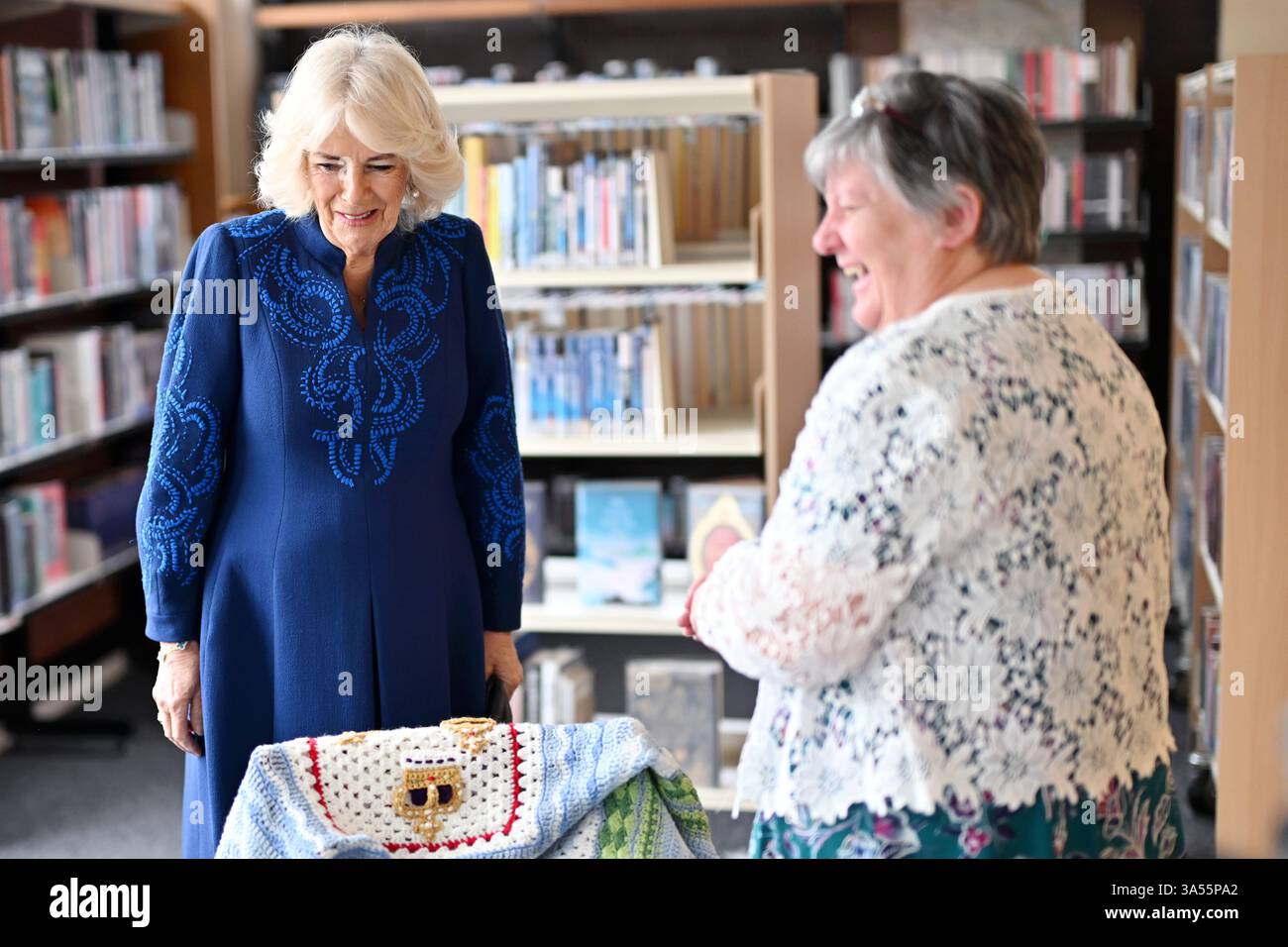Queen Camilla meets locals during a visit to Banbridge Library on day ...