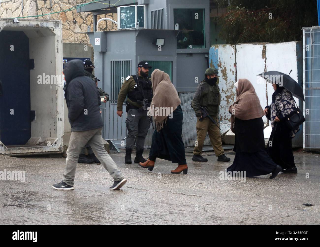 Palestinians, living in West Bank, gather at the Israeli military ...