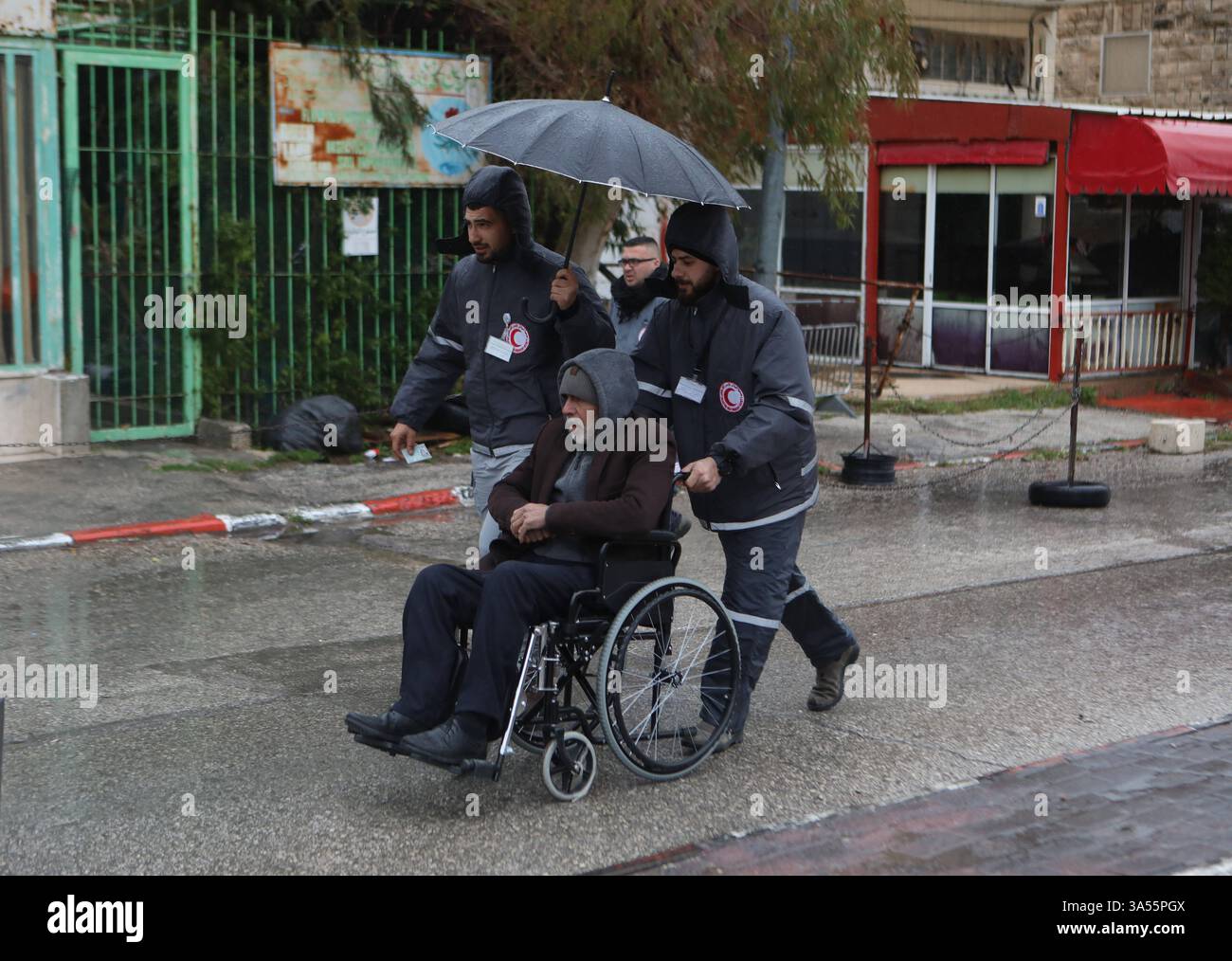 Palestinians, living in West Bank, gather at the Israeli military ...