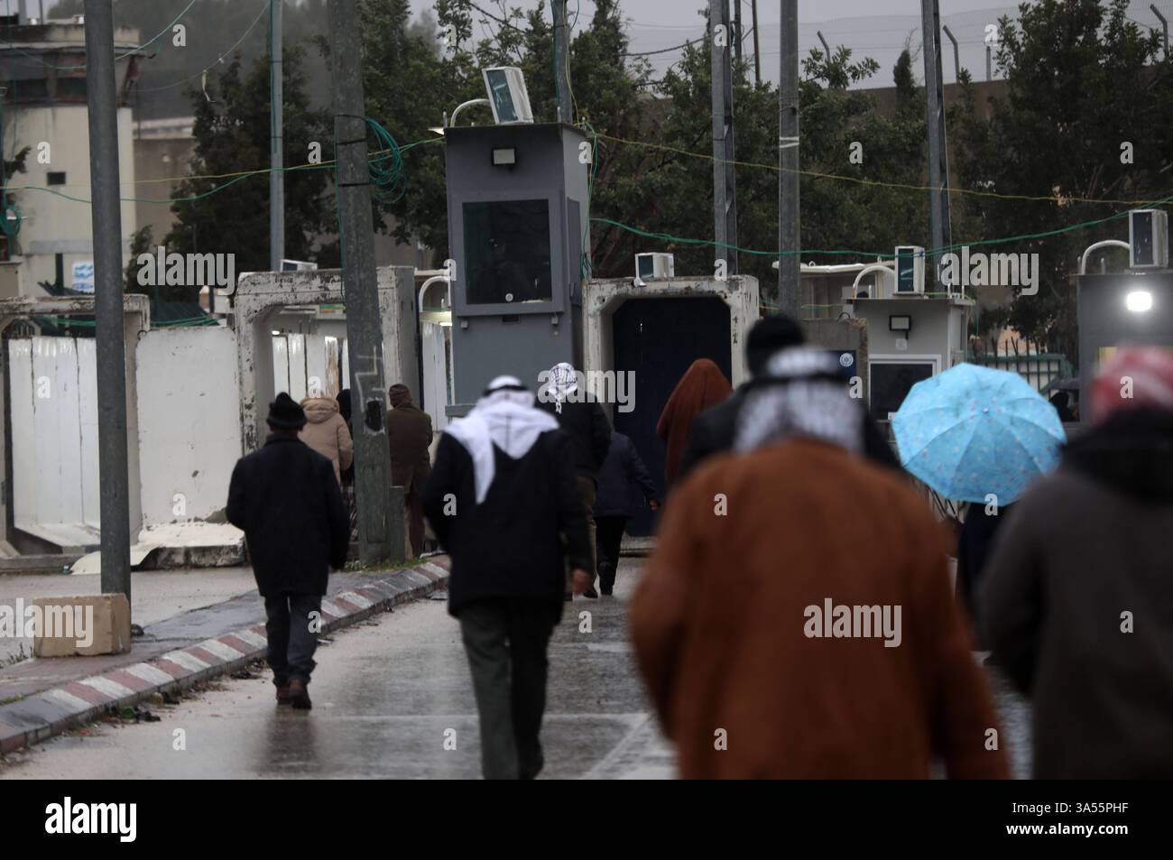Palestinians, living in West Bank, gather at the Israeli military ...