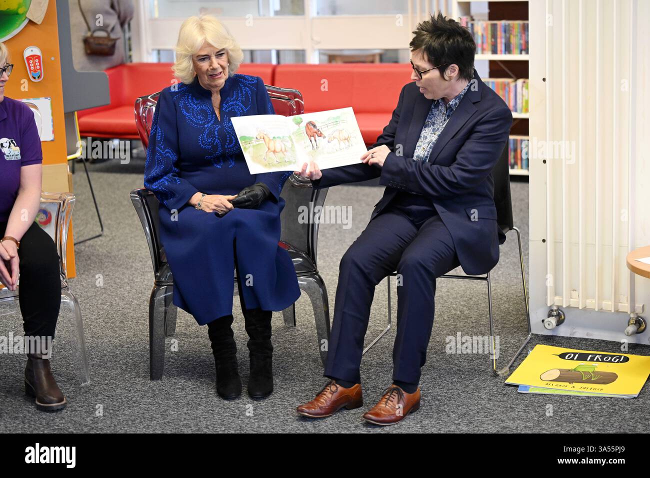 Queen Camilla views a book reading during a visit to Banbridge Library ...