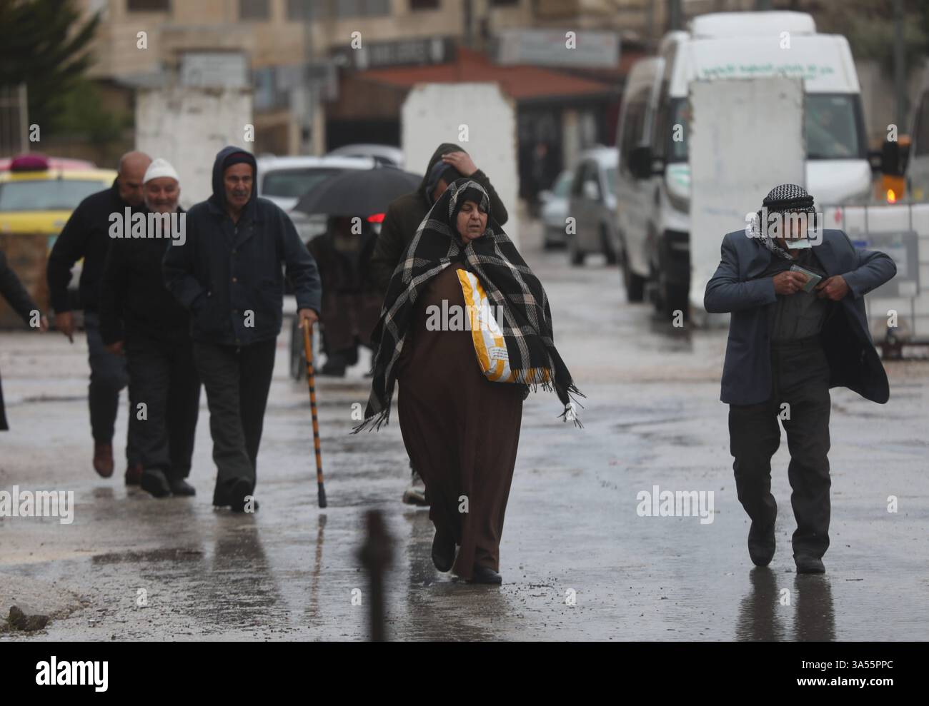 Palestinians, living in West Bank, gather at the Israeli military ...