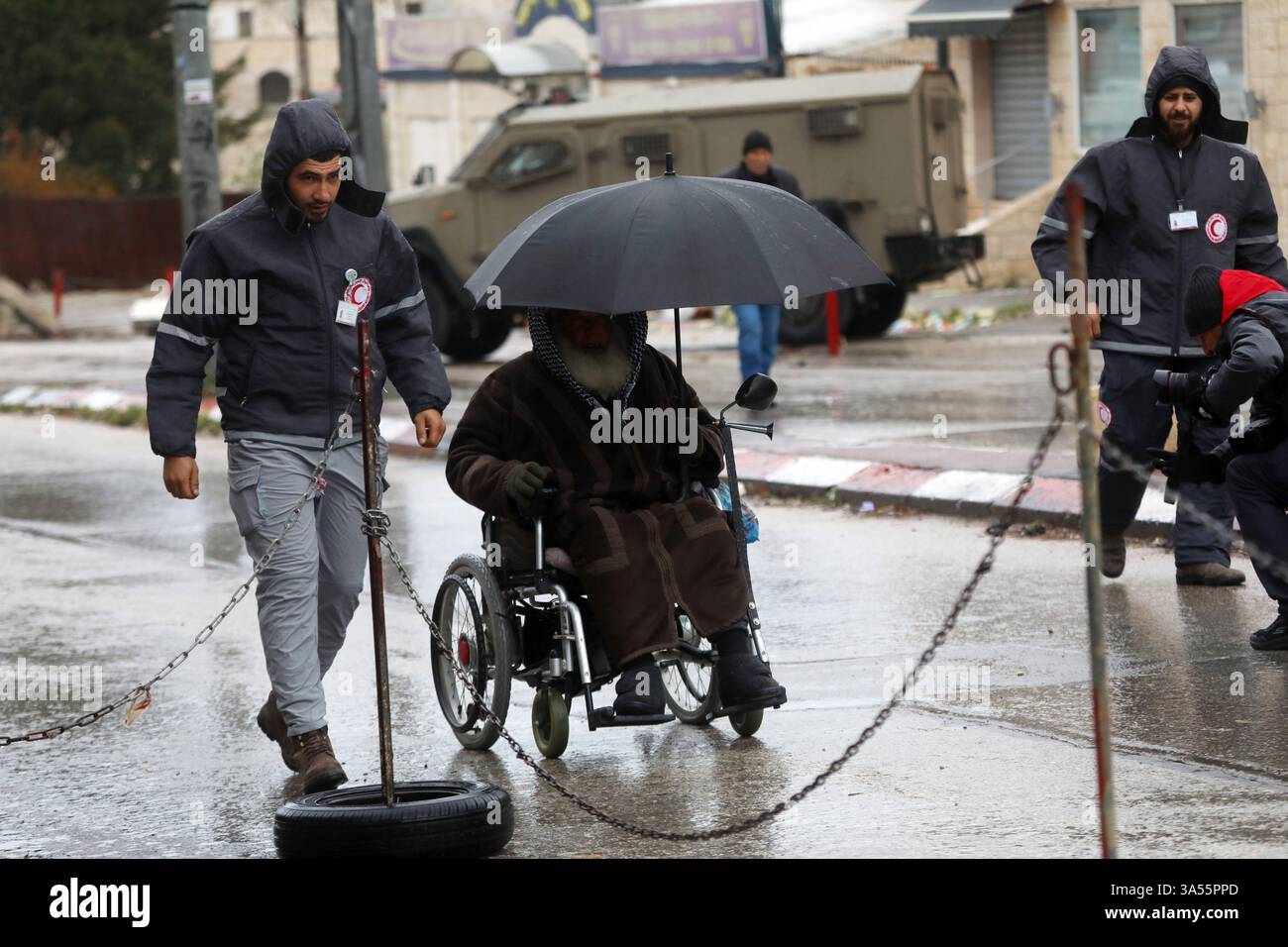 Palestinians, living in West Bank, gather at the Israeli military ...