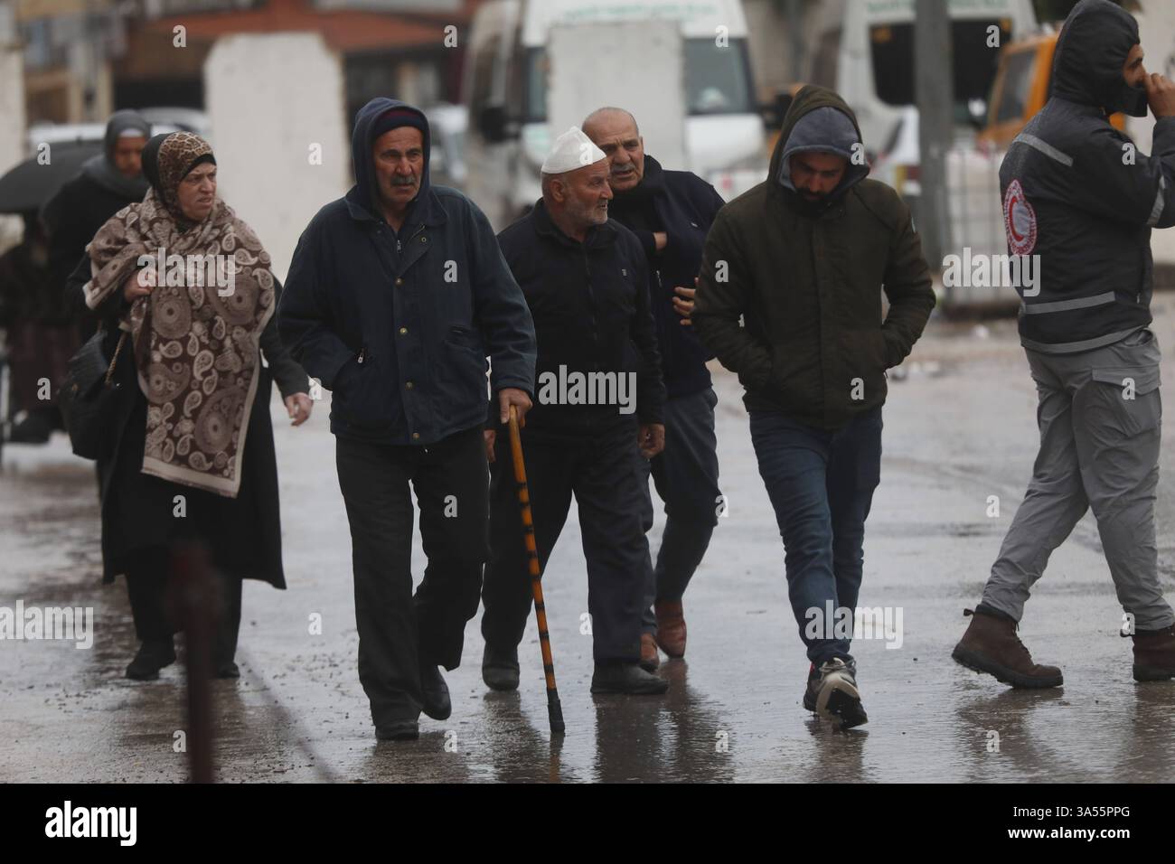 Palestinians, living in West Bank, gather at the Israeli military ...