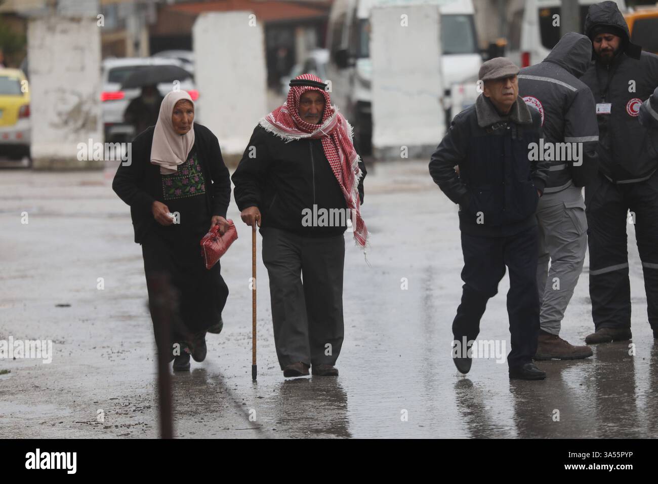 Palestinians, living in West Bank, gather at the Israeli military ...