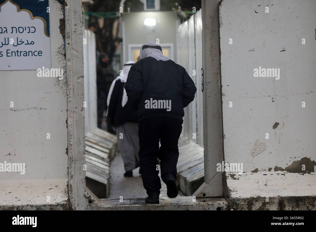 Palestinians, living in West Bank, gather at the Israeli military ...
