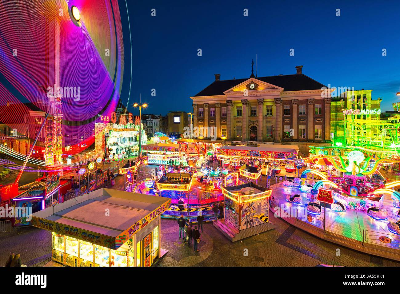 A traditional funfair in the city with lots of fun and enjoyment at ...