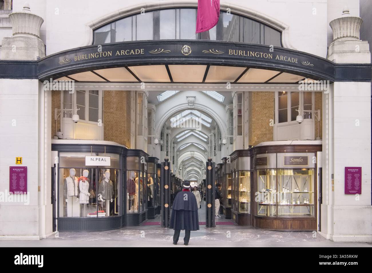 A beadle (a victorian security guard) stands outside in the historic ...