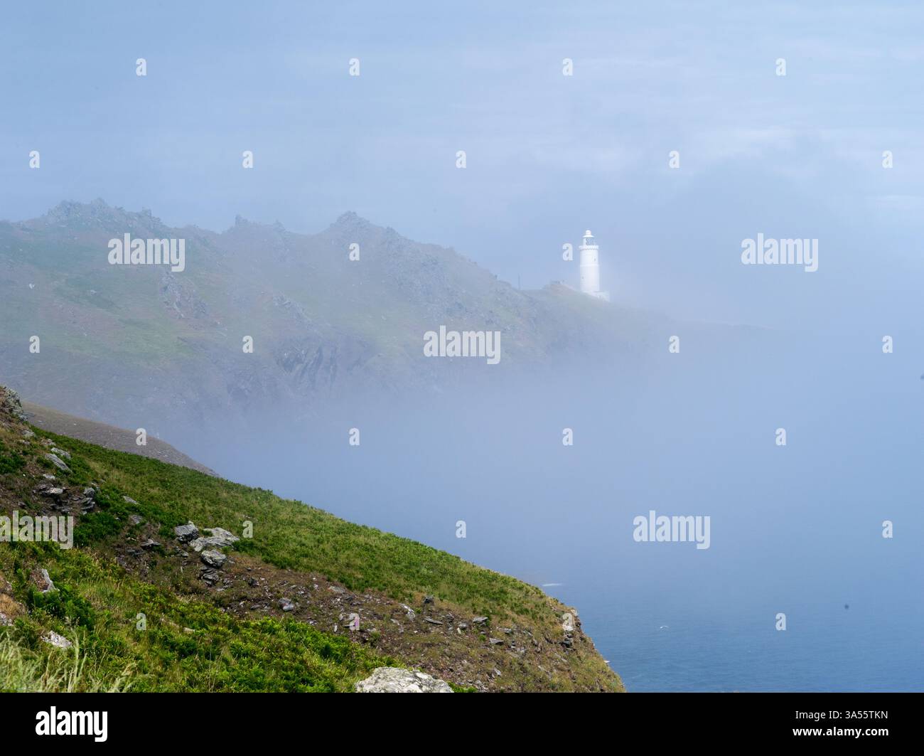 Start Point lighthouse, Devon UK variations of scene in fog Stock Photo ...