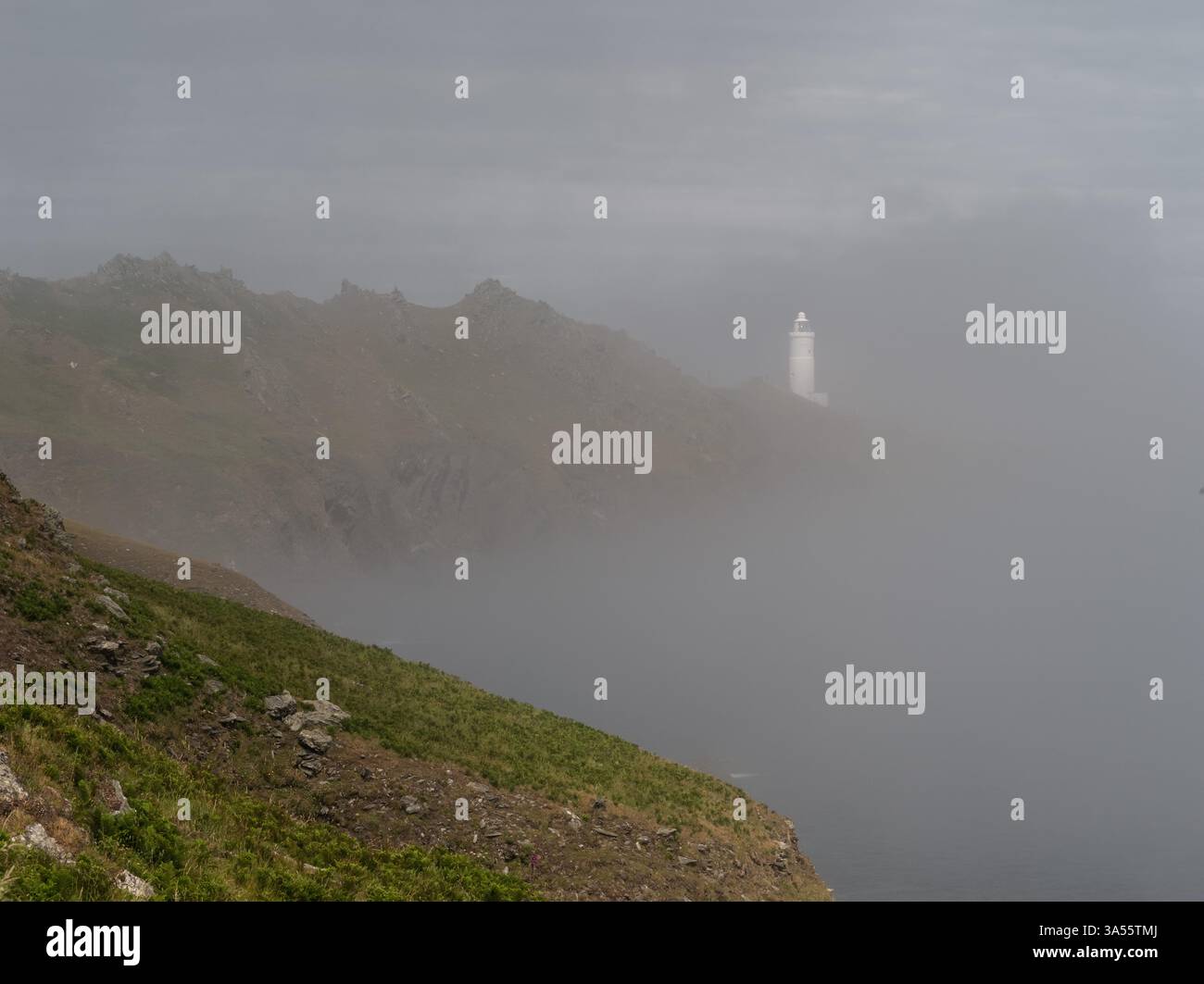 Start Point lighthouse, Devon UK variations of scene in fog Stock Photo ...