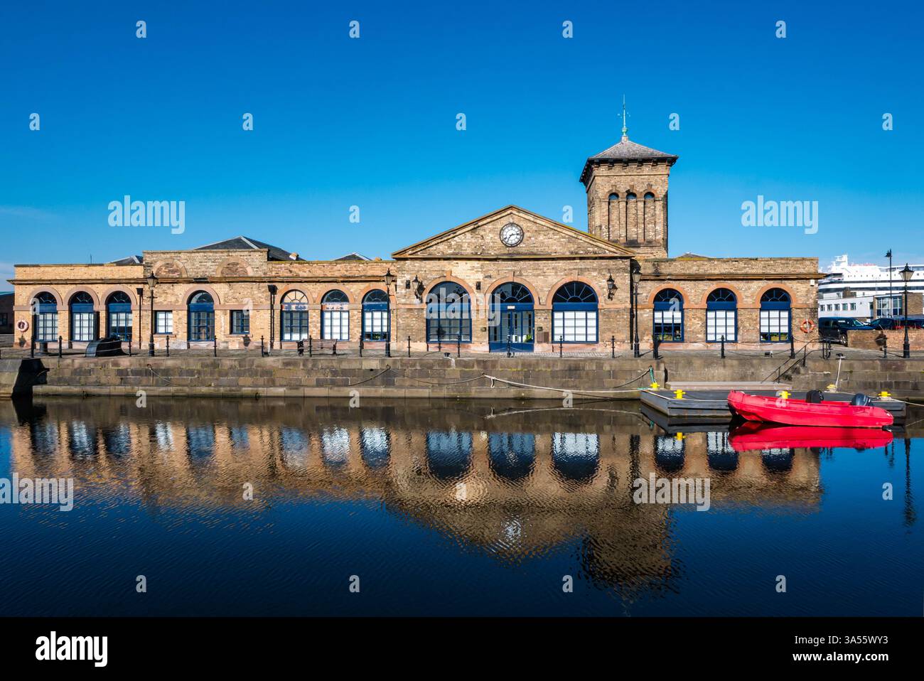Reflections of Forht Ports Victorian office building in Leith Harbour ...
