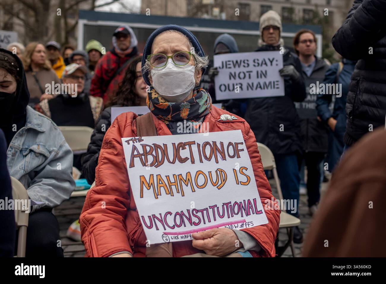 NEW YORK, NEW YORK - MARCH 20: ?A protestor holds a sign that reads ...