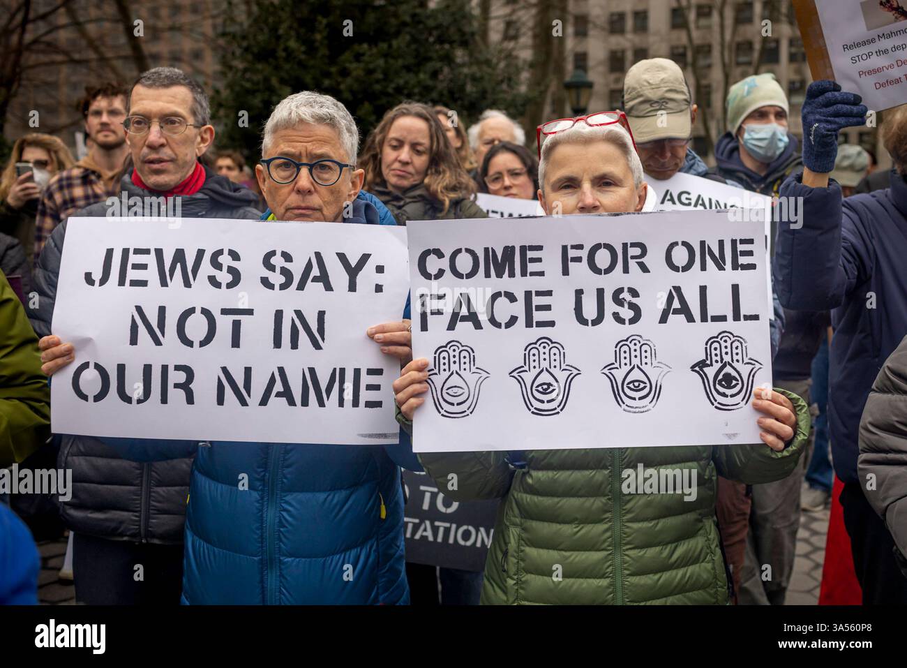 NEW YORK, NEW YORK - MARCH 20: ?Protestors hold signs that read, "Jews ...