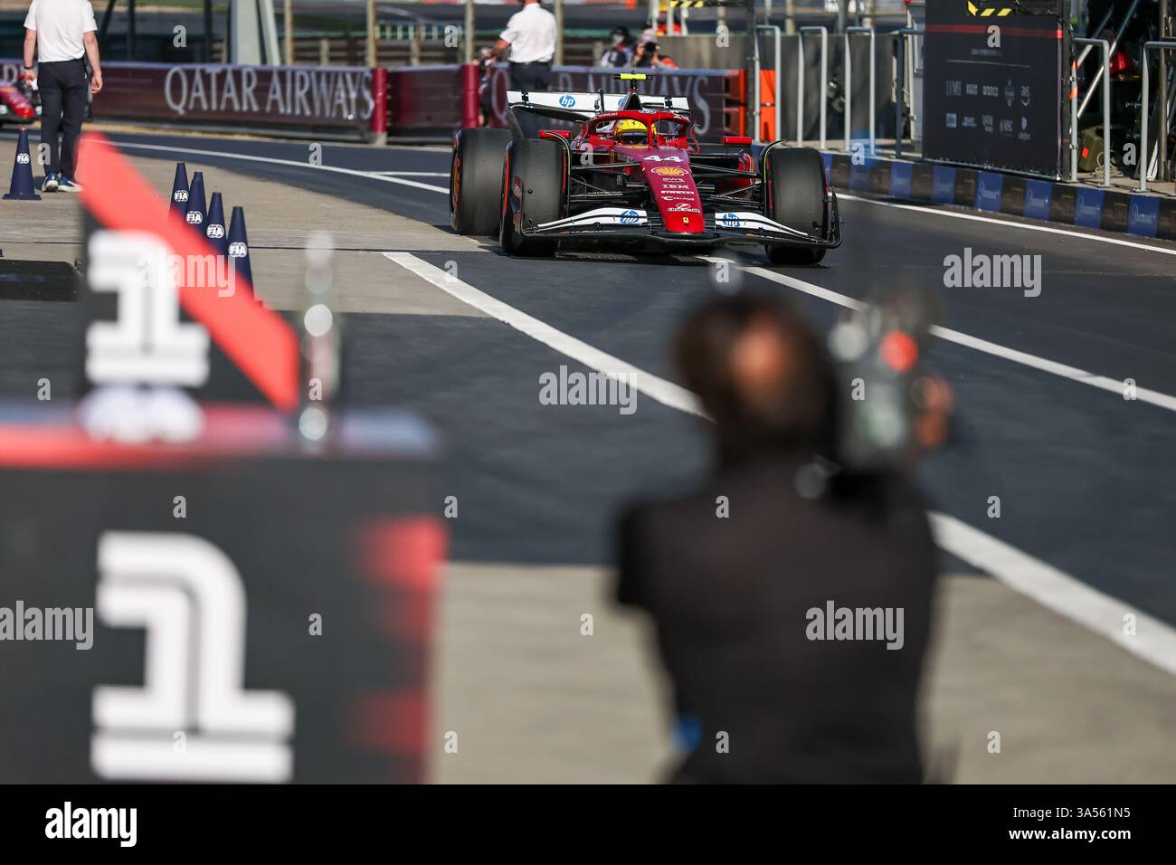 SHANGHAI, CHINA- MARCH 21: Lewis Hamilton of Great Britain and Scuderia ...