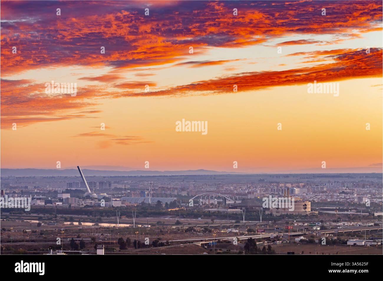 At sunrise, Seville's aerial view bursts with color, featuring La ...