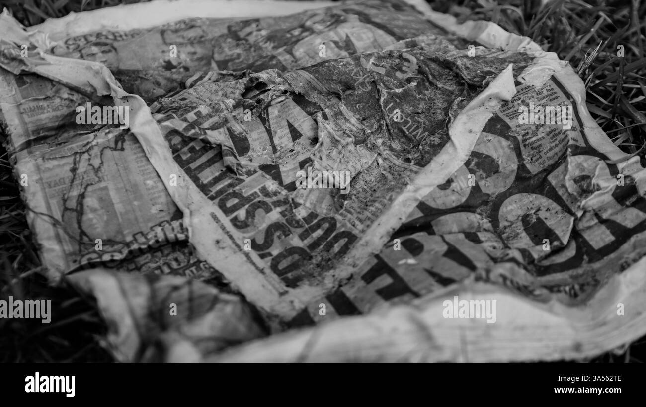 Wet newspaper Black and White Stock Photos & Images - Alamy