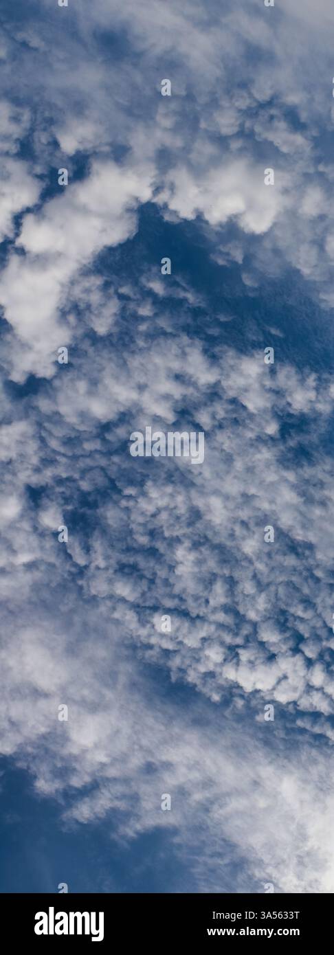 Vertical cloudy blue sky, cloud gradient Stock Photo - Alamy