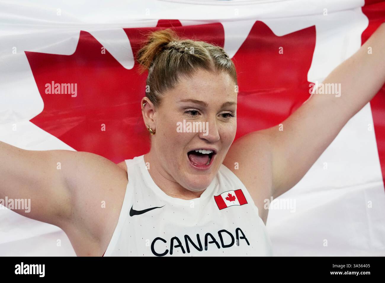 Sarah Mitton, of Canada, celebrates after winning the gold medal in the ...