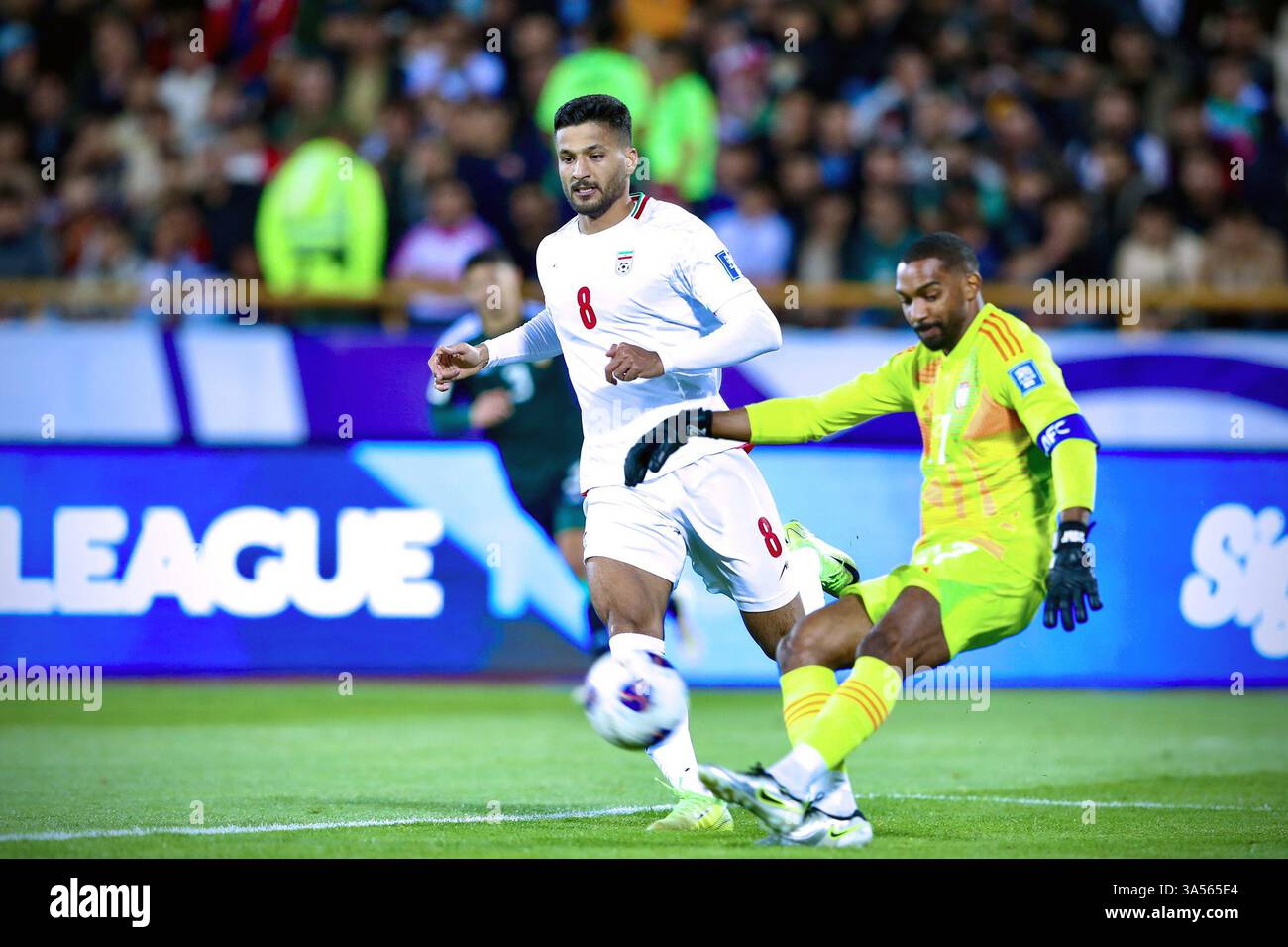 Tehran, Iran. 20th Mar, 2025. Football players compete during the FIFA ...