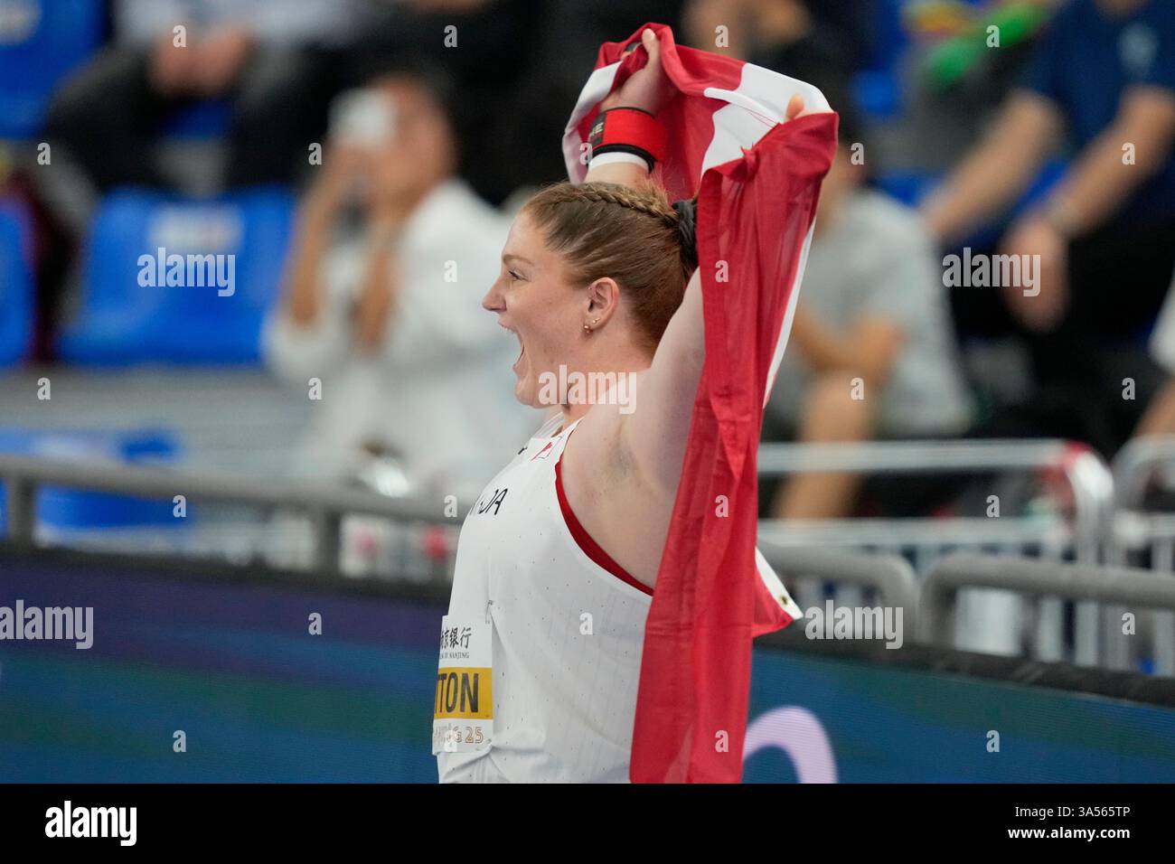 Sarah Mitton, of Canada, celebrates after winning the gold medal in the ...