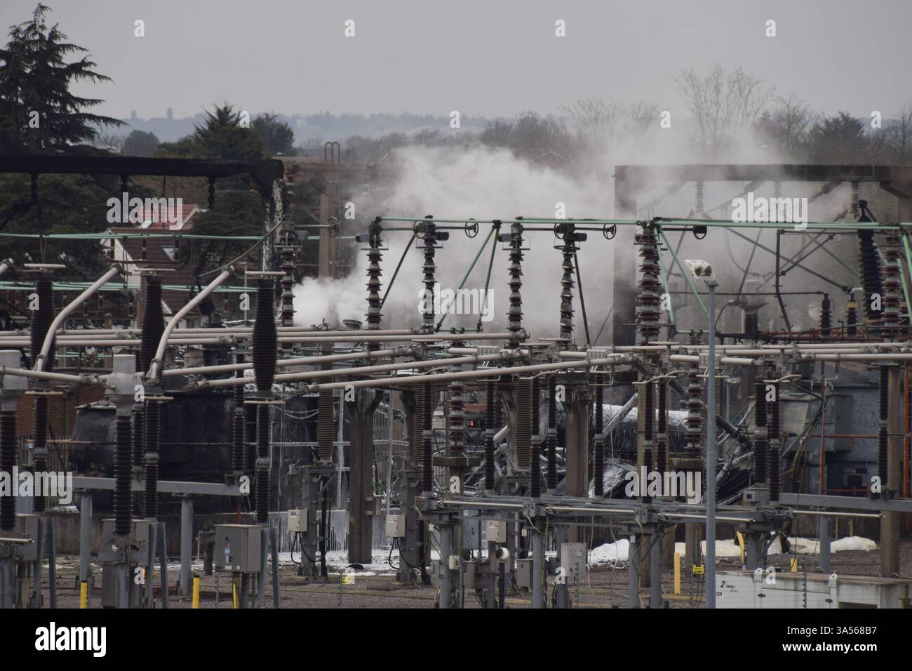 March 21, 2025, London, England, UK: Firefighters spray the structure ...