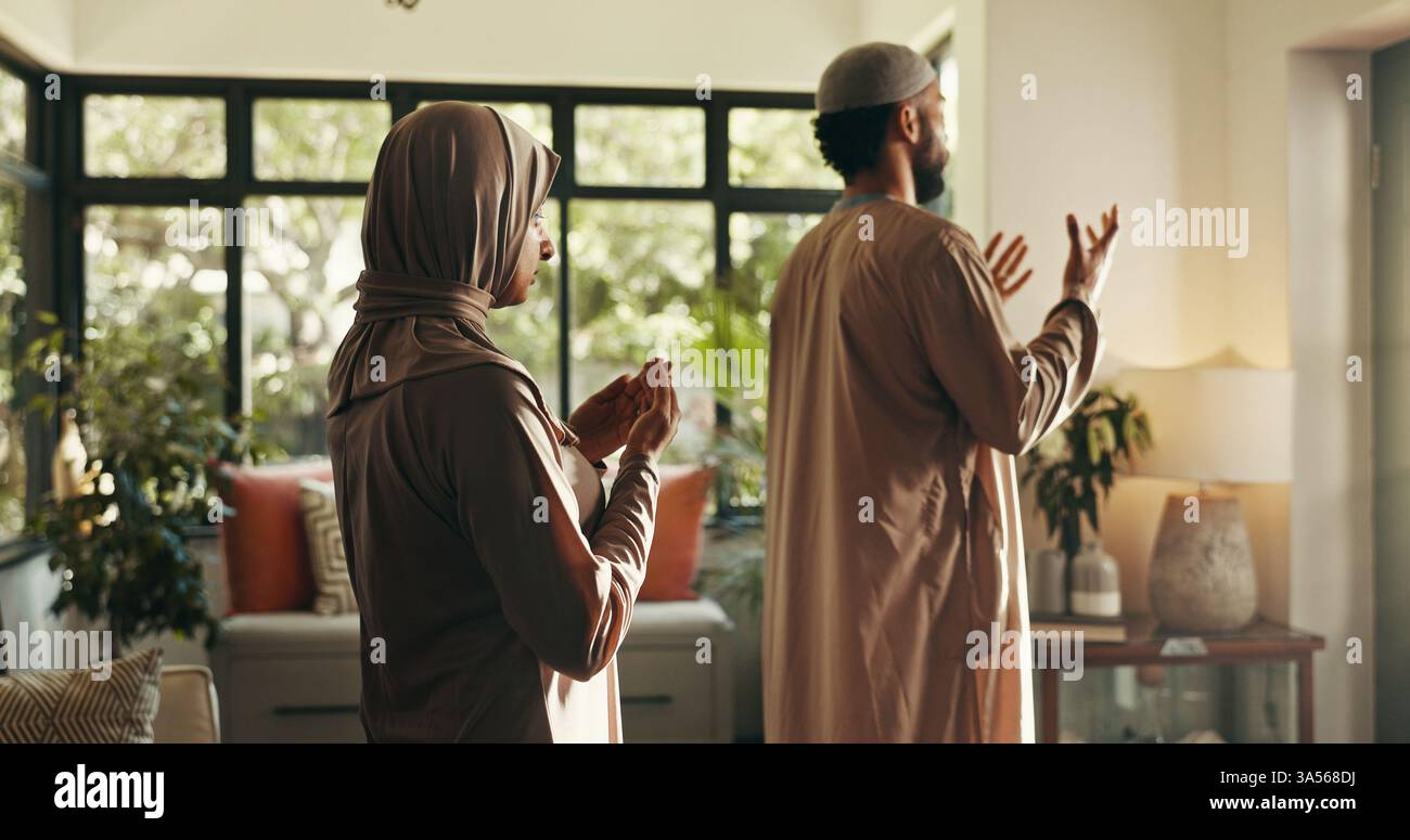 Muslim, couple and prayer for religion at home of spiritual worship ...