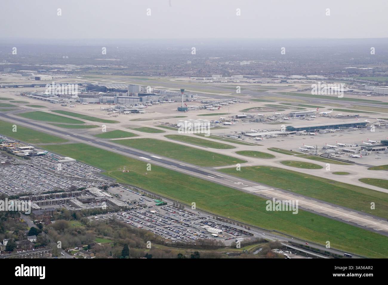 An empty runway at Heathrow Airport. More than 1,300 flights to and ...