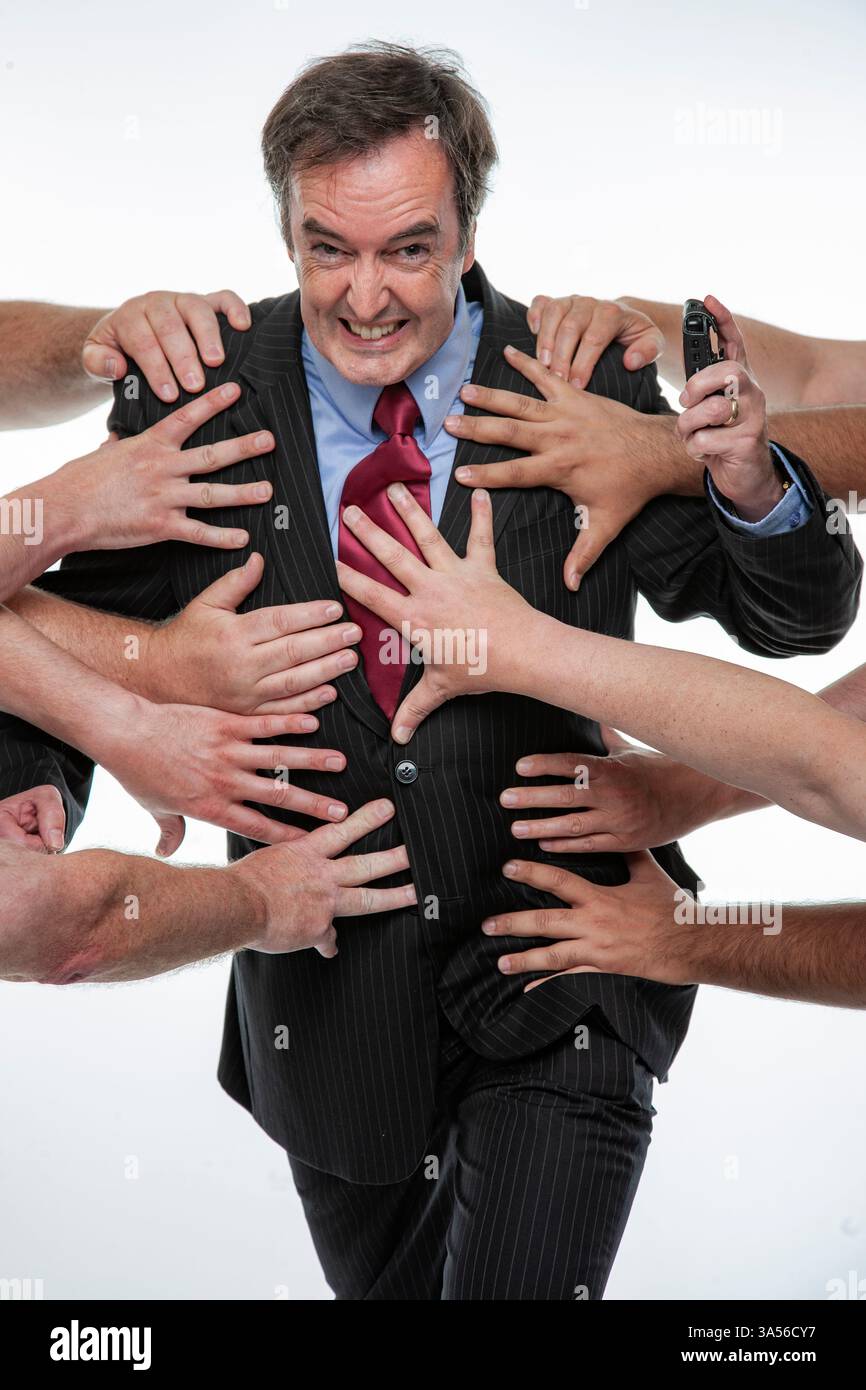 Being held back hi-res stock photography and images - Alamy