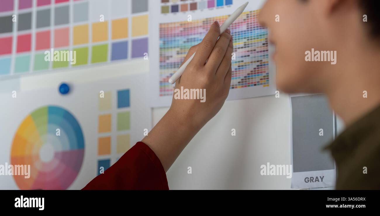 Creative Ideation and Color Selection. Team member selects colors from a comprehensive palette ...