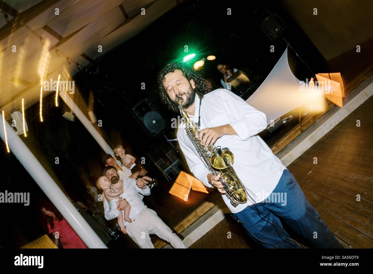 San Francisco, California, USA - May 21, 2024: Saxophonist plays the ...
